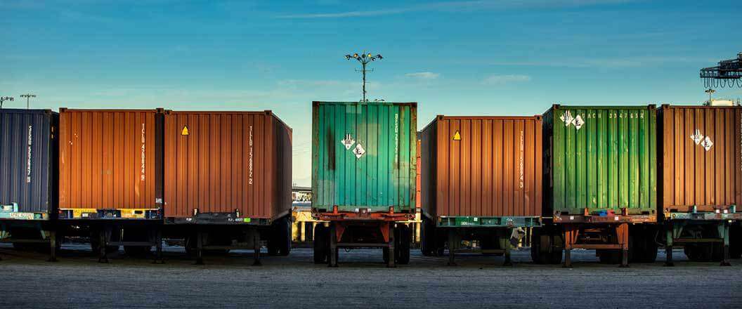 How to Transport a Shipping Container: Overcome Challenges